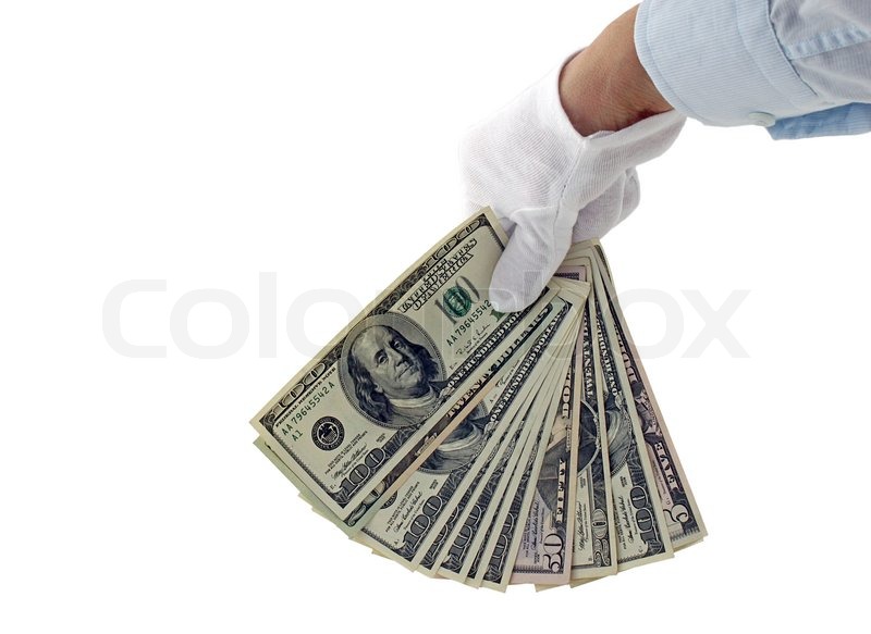 Hand in gloves giving money over white | Stock image | Colourbox