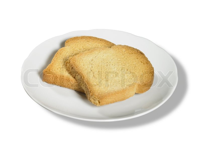Rusk slices on porcelain plate | Stock Photo | Colourbox