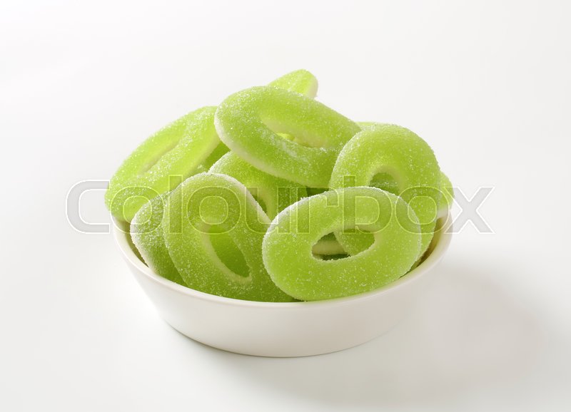 Ring-shaped apple gummies coated in ... | Stock image | Colourbox