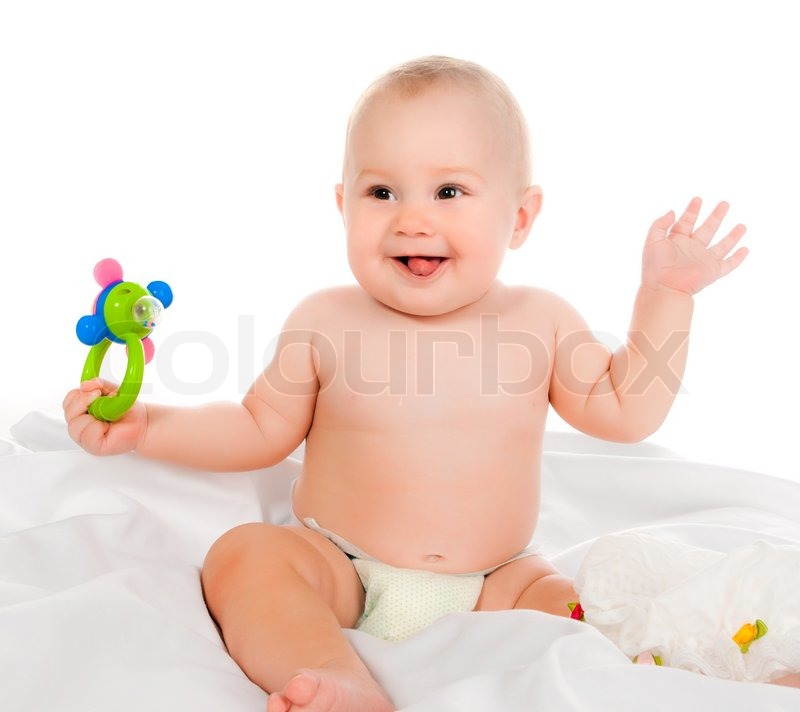 Kleines Kind in ein Handtuch auf weißem ... | Stock Bild | Colourbox