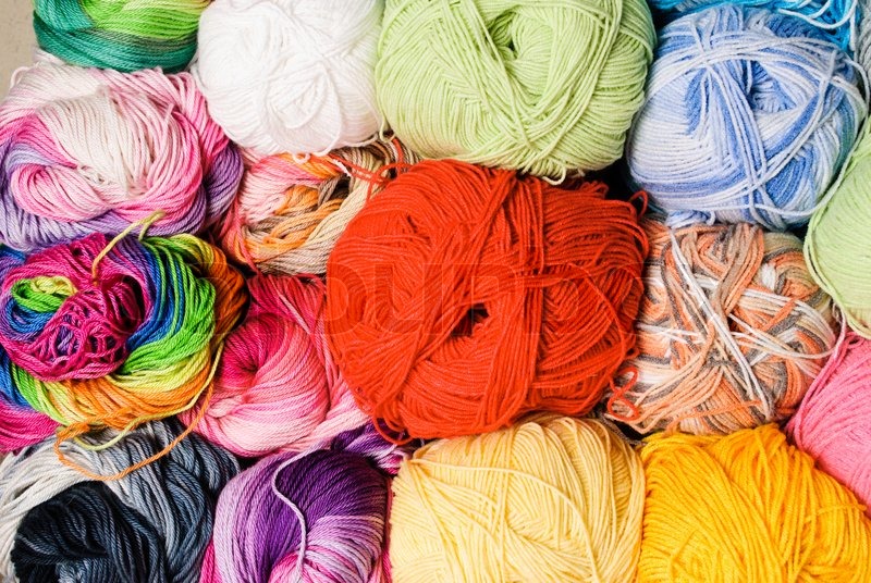 Different color threads on rows in the ... | Stock image | Colourbox