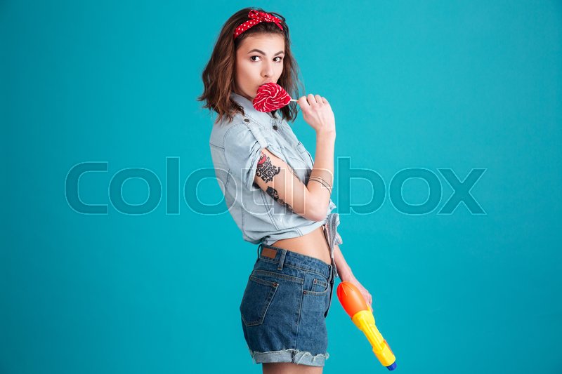 Image of young pretty woman standing ... | Stock image | Colourbox