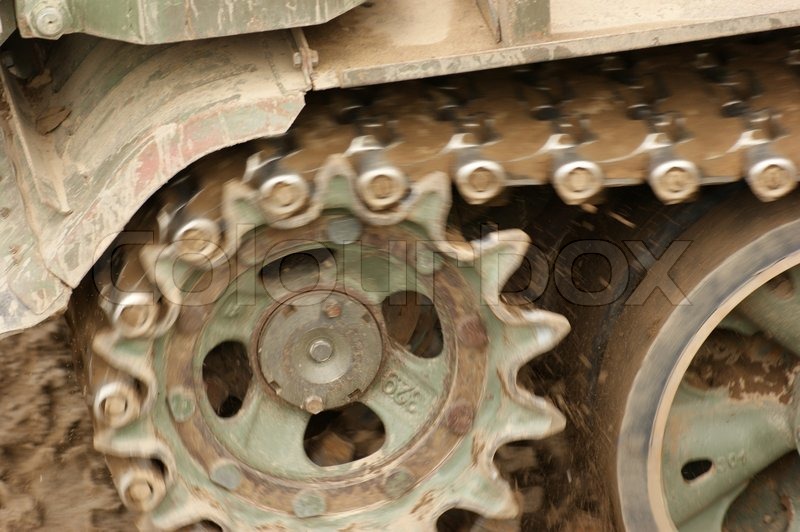 Detail of some tank tracks in earthy ... | Stock image | Colourbox