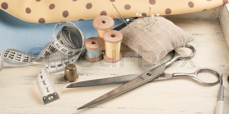 Set of reel of thread, scissors, fabric ... | Stock image | Colourbox