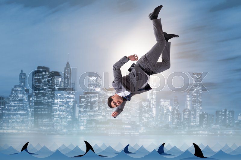 Businessman falling into sea with ... | Stock image | Colourbox