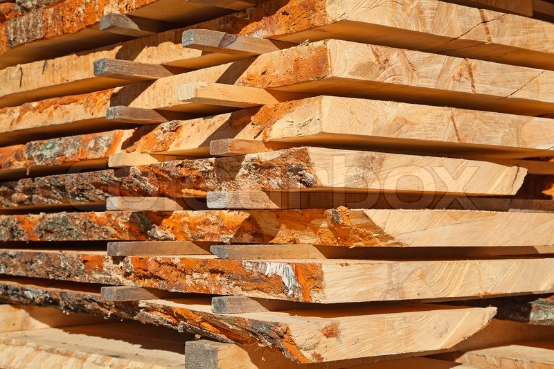 Stack of new wooden studs at the lumber ... | Stock image | Colourbox