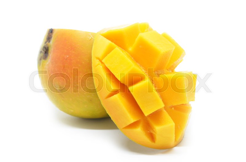 Mango cubes slices close up with mangos ... | Stock image | Colourbox
