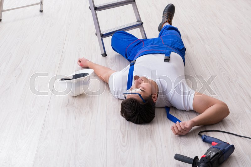 Worker after falling from height - ... | Stock image | Colourbox