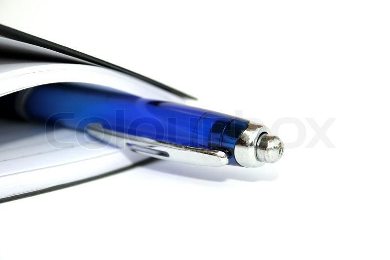 Blue pen in the black note-book | Stock Photo | Colourbox