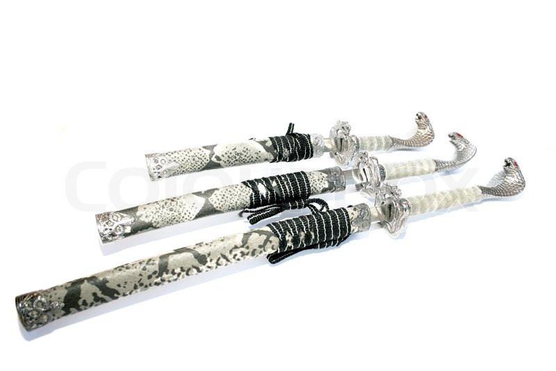 Three daggers isolated on white ... | Stock image | Colourbox