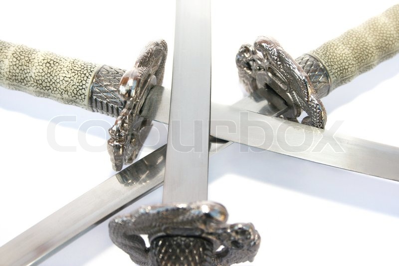 Three daggers isolated on white ... | Stock image | Colourbox