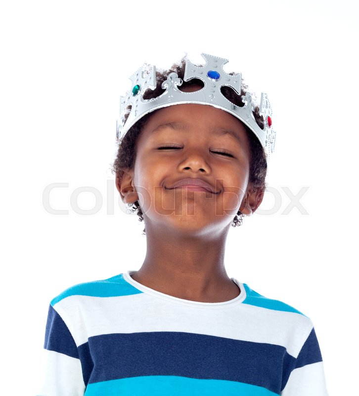 Happy african child with silvered crown ... | Stock image | Colourbox