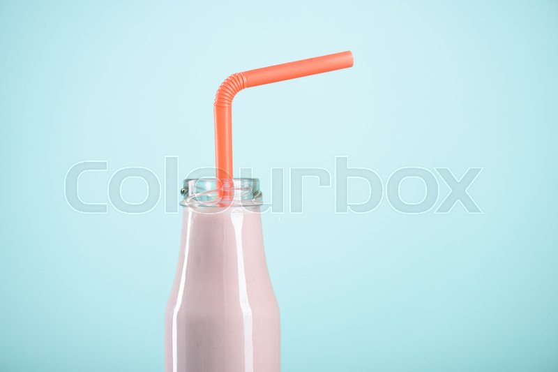 Homemade pink milkshake in glass bottle ... | Stock image | Colourbox