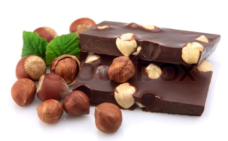 Delicious chocolate with nuts closeup | Stock Photo | Colourbox