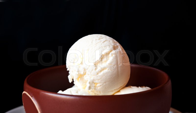 Ice cream in the ceramic cup | Stock image | Colourbox