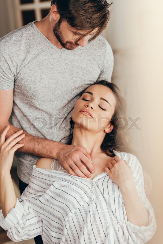 Man touching chest of young sensual ... | Stock image | Colourbox