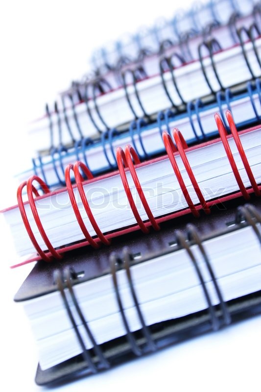 Stack of colorful copybooks isolated on ... | Stock Photo | Colourbox