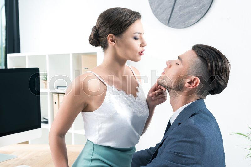Young passionate secretary seducting ... | Stock image | Colourbox