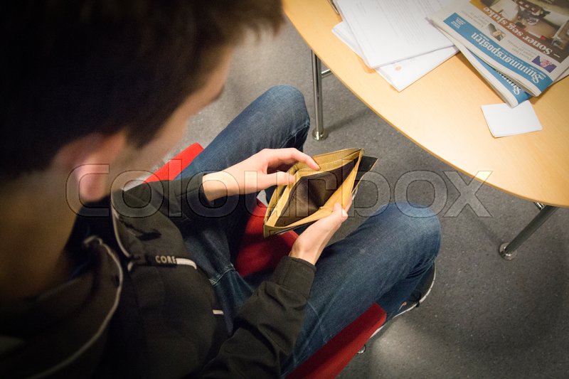 Young man with no money | Stock image | Colourbox