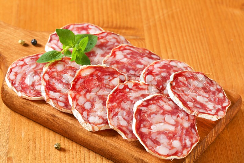 Sliced French dry sausage (Saucisson ... | Stock image | Colourbox