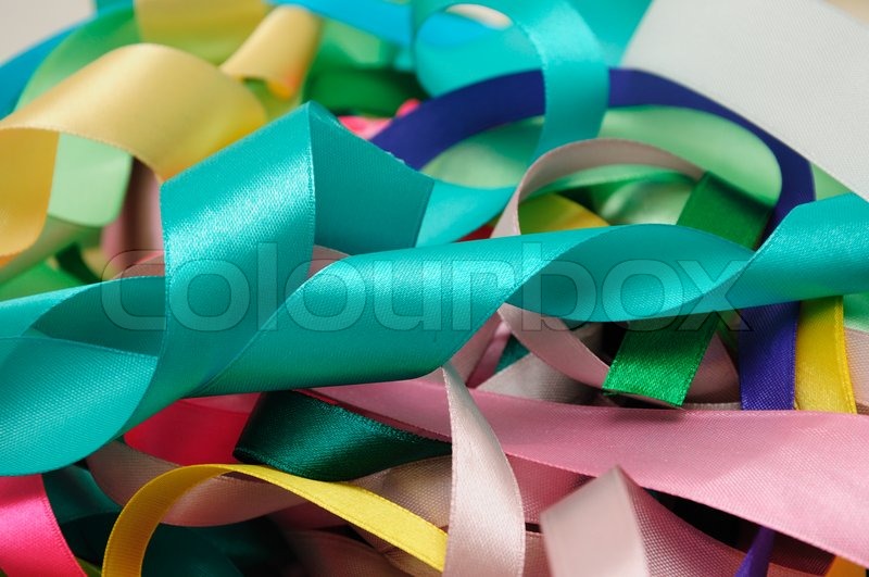 Multi-colored satin ribbons in a ... | Stock Photo | Colourbox