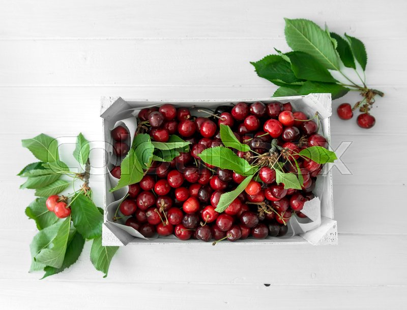Huge box with ripe red cherries with ... | Stock image | Colourbox