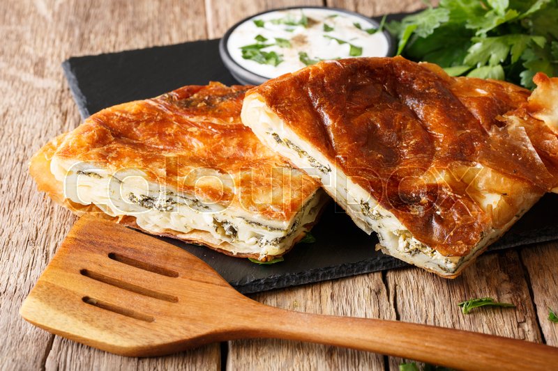 Balkan burek stuffed with spinach and ... | Stock Photo | Colourbox