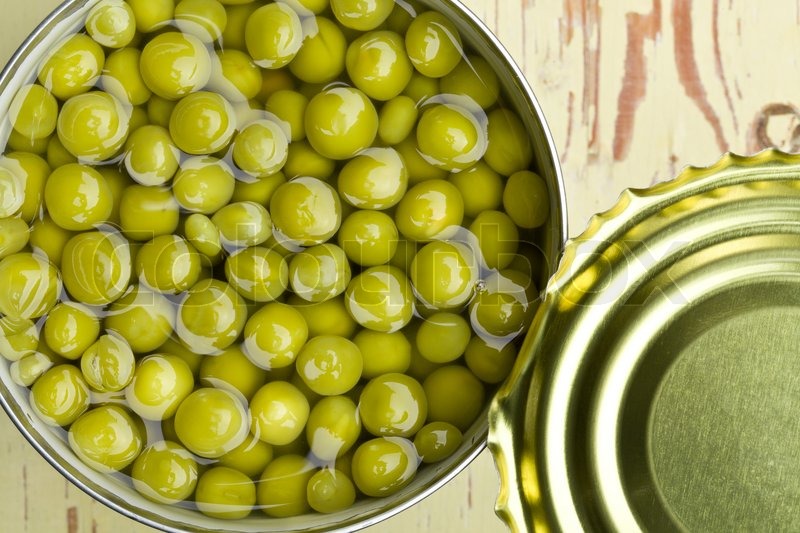 Canned green peas in open tin can | Stock image | Colourbox