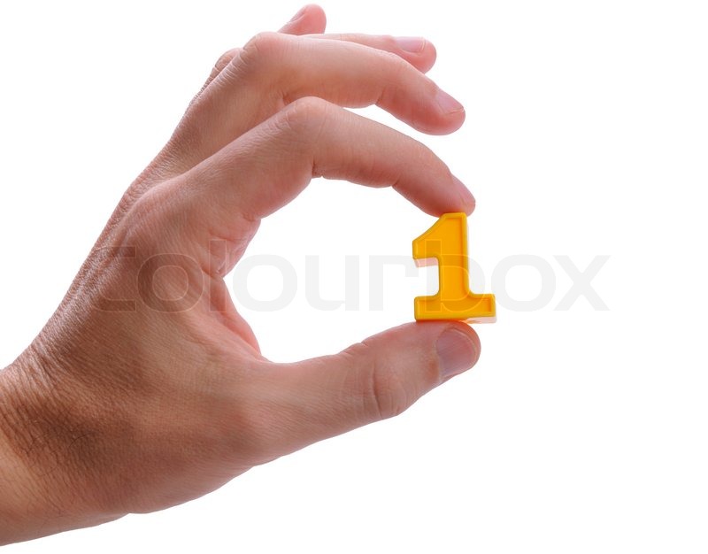 Man's hand holding number one | Stock image | Colourbox