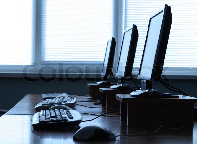 Row of computers in an office | Stock image | Colourbox