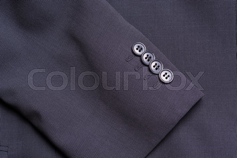 Four buttons on a black business jacket ... | Stock image | Colourbox
