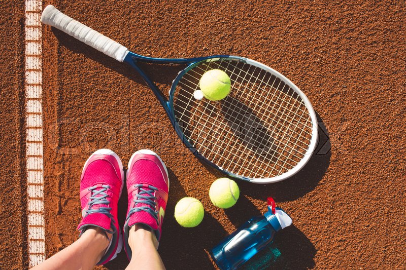 Tennis equipment and bottle of water on ... | Stock image | Colourbox
