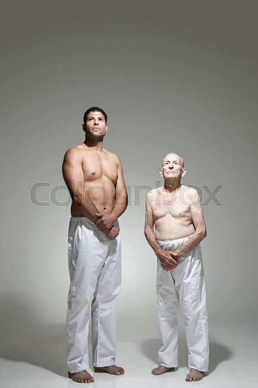 Yound and old man standing together | Stock image | Colourbox