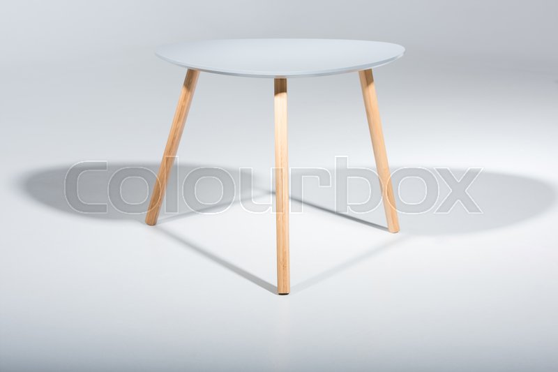 Studio shot of stylish stool with white ... | Stock image | Colourbox