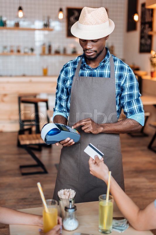 Handsome African American Waiter Using Stock Image Colourbox