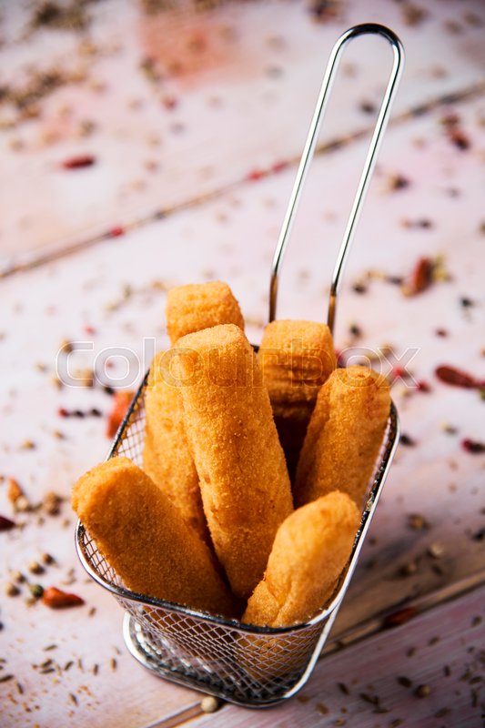 Some appetizing fish sticks served in a ... | Stock image | Colourbox