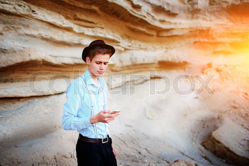 An attractive man looking at the screen ... | Stock image | Colourbox