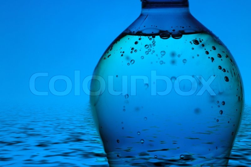 Pure water in a bottle with air bubbles | Stock image | Colourbox