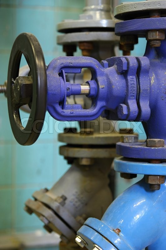 Steam pipe with a valve in the boiler ... | Stock image | Colourbox