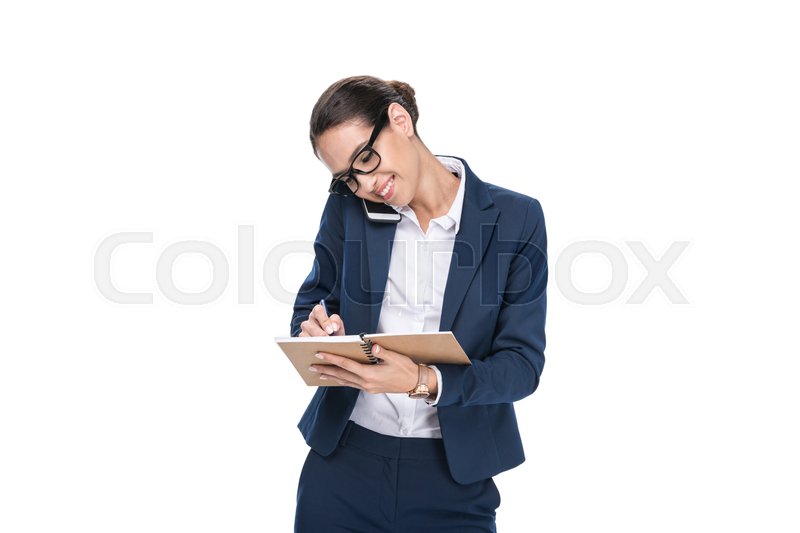 Beautiful businesswoman in grey suit ... | Stock Photo | Colourbox