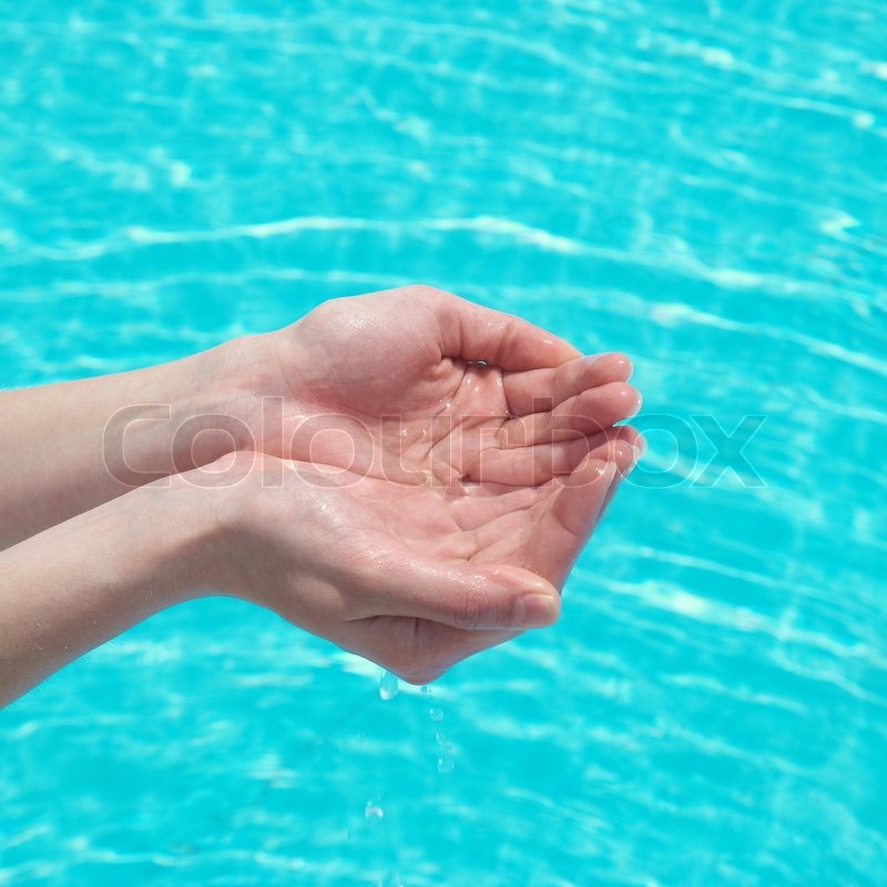 Human hands with clear water on the ... | Stock image | Colourbox