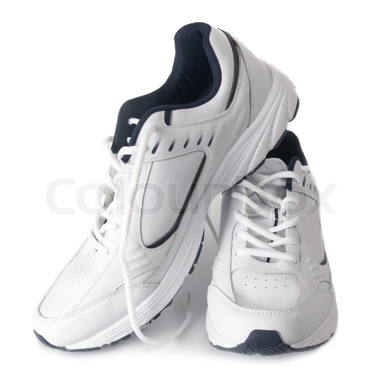 Pair white of trainers on isolated background | Stock Photo | Colourbox