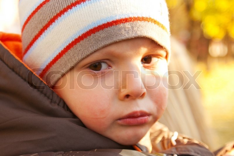 Little boy crying outdoors | Stock image | Colourbox