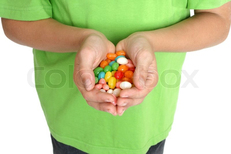 Child's hands holding a handful of ... | Stock image | Colourbox