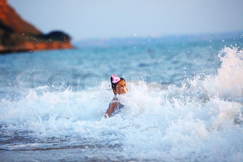 Little girl in the sea | Stock image | Colourbox