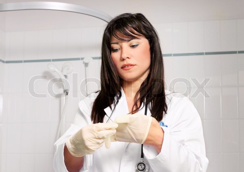 Woman doctor washes and prepares for ... | Stock image | Colourbox