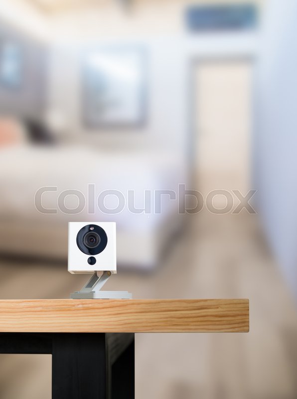 Security camera on Wood table. IP ... | Stock image | Colourbox