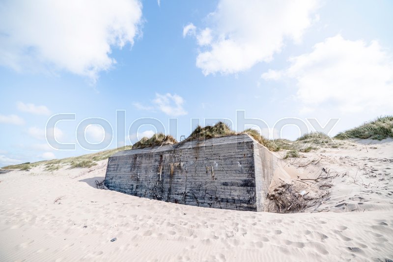 Bunker in a dune on a beach in Denmark ... | Stock image | Colourbox