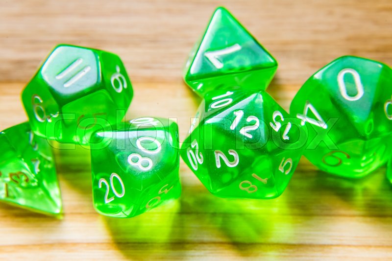 A lot of translucent green playing dice ... | Stock image | Colourbox