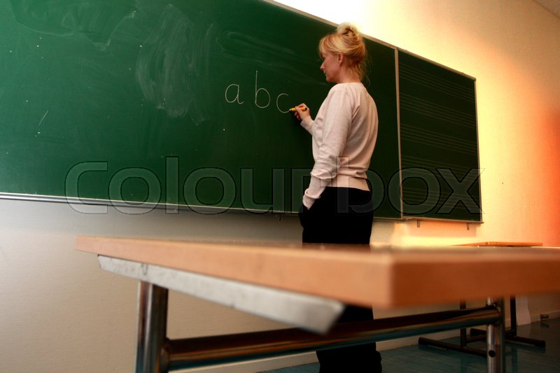 Teacher by the Blackboard | Stock image | Colourbox